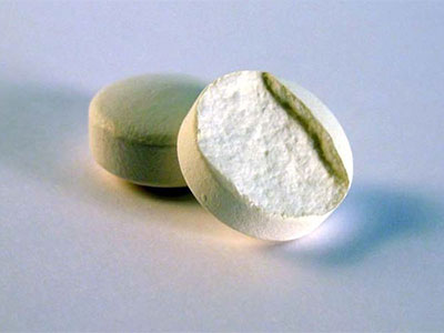 Causes and solutions for dark spots in tablet manufacturing